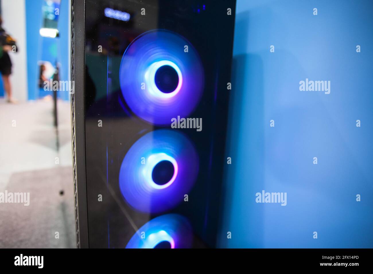 Blue illumination of a cooler PC system unit. Computer fan with LED ...