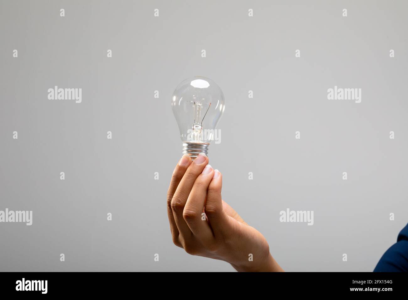 Person holding bulb hi-res stock photography and images - Alamy