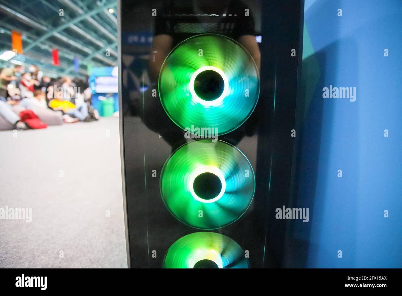 Green, green and yellow illumination of a cooler PC system unit ...