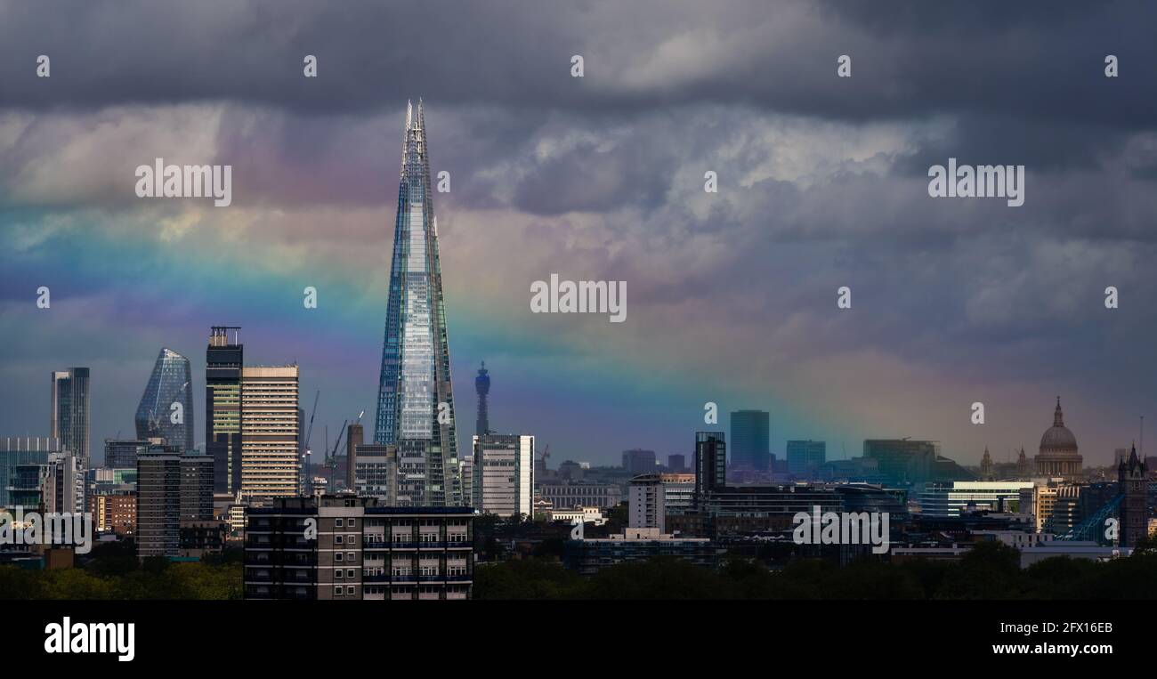 UK Weather: A massive rainbow illuminates The Shard skyscraper building ...