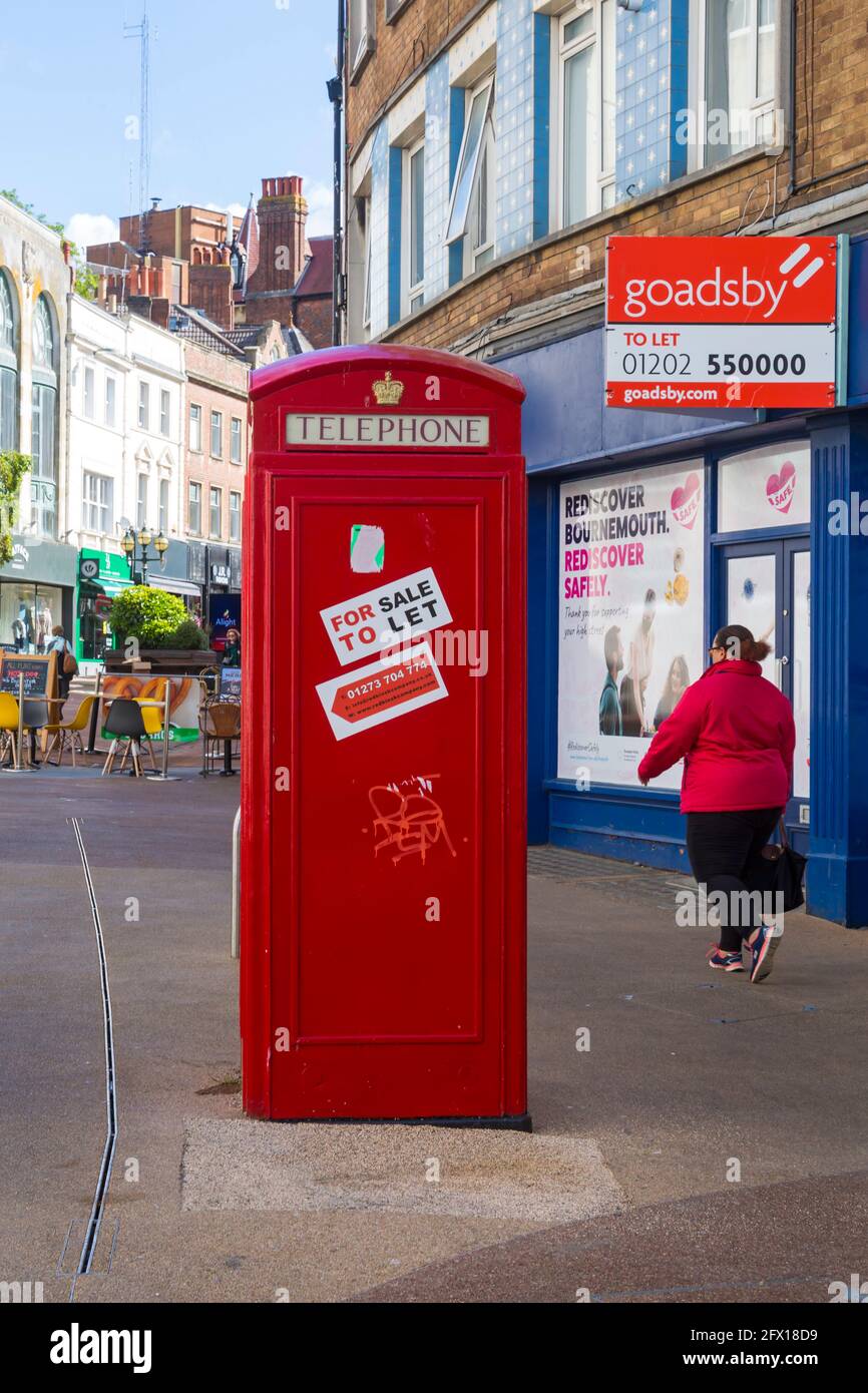 Bournemouth, Dorset, UK. 25th May, 2021. Two iconic red telephone boxes ...