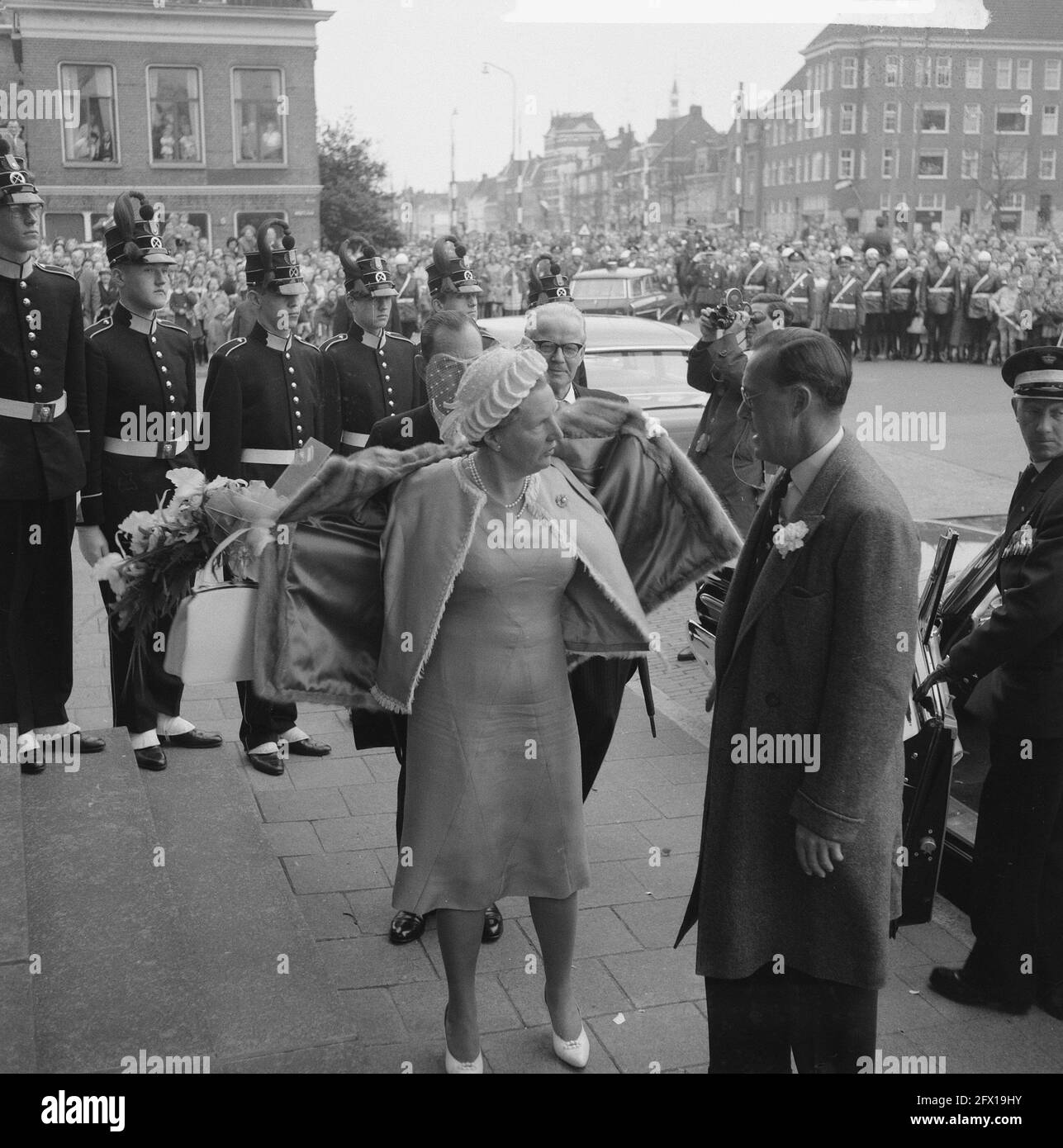 Queen takes off cloak hi-res stock photography and images - Alamy