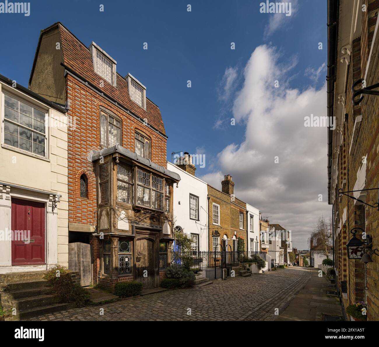 Houses on the Cobb led high street in Upper Upnor on the banks of the ...