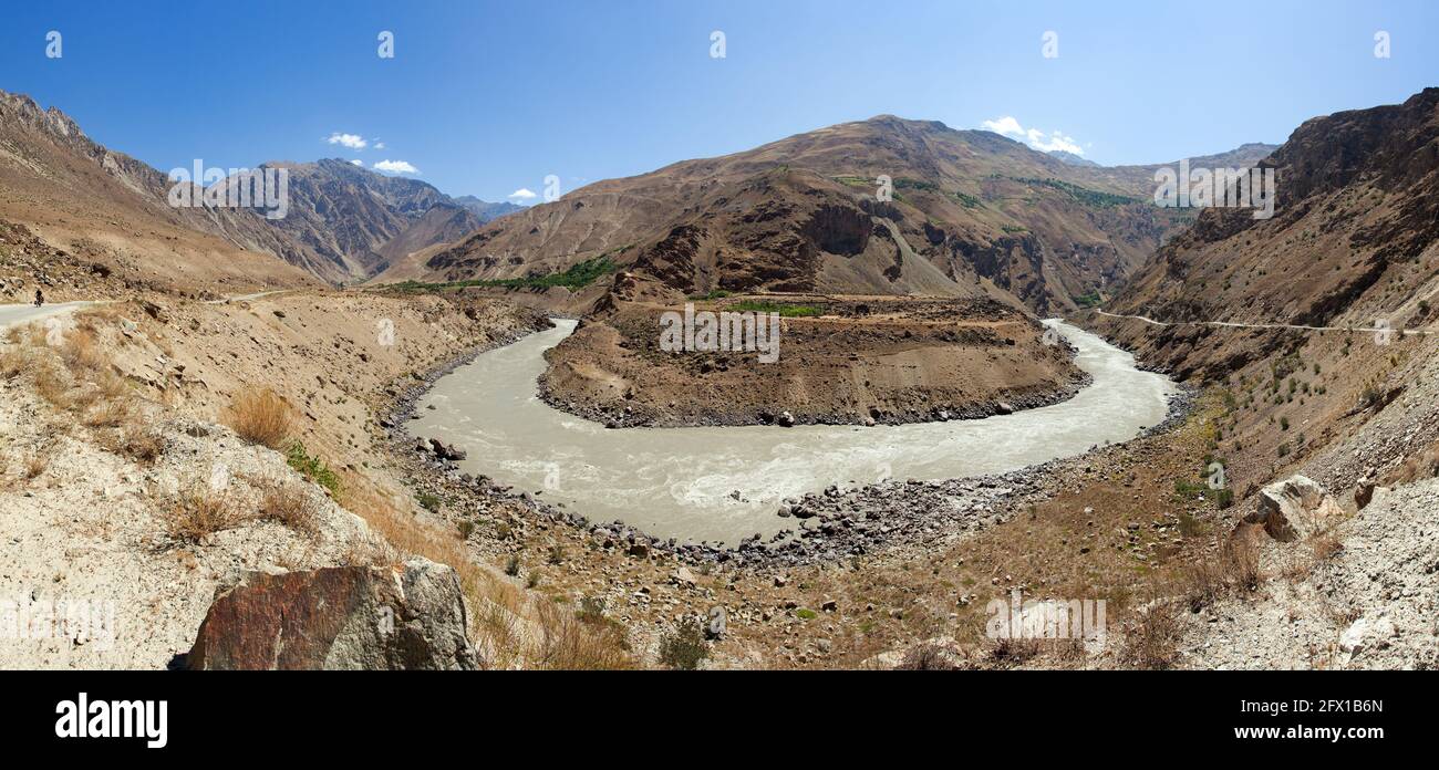 Panj river and Pamir mountains panoramic view. Panj is upper part of ...