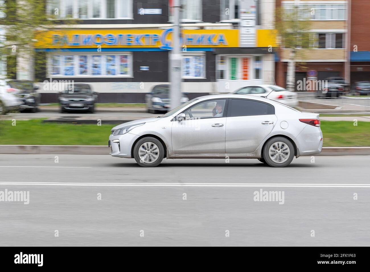 Car Driving On Road Side View