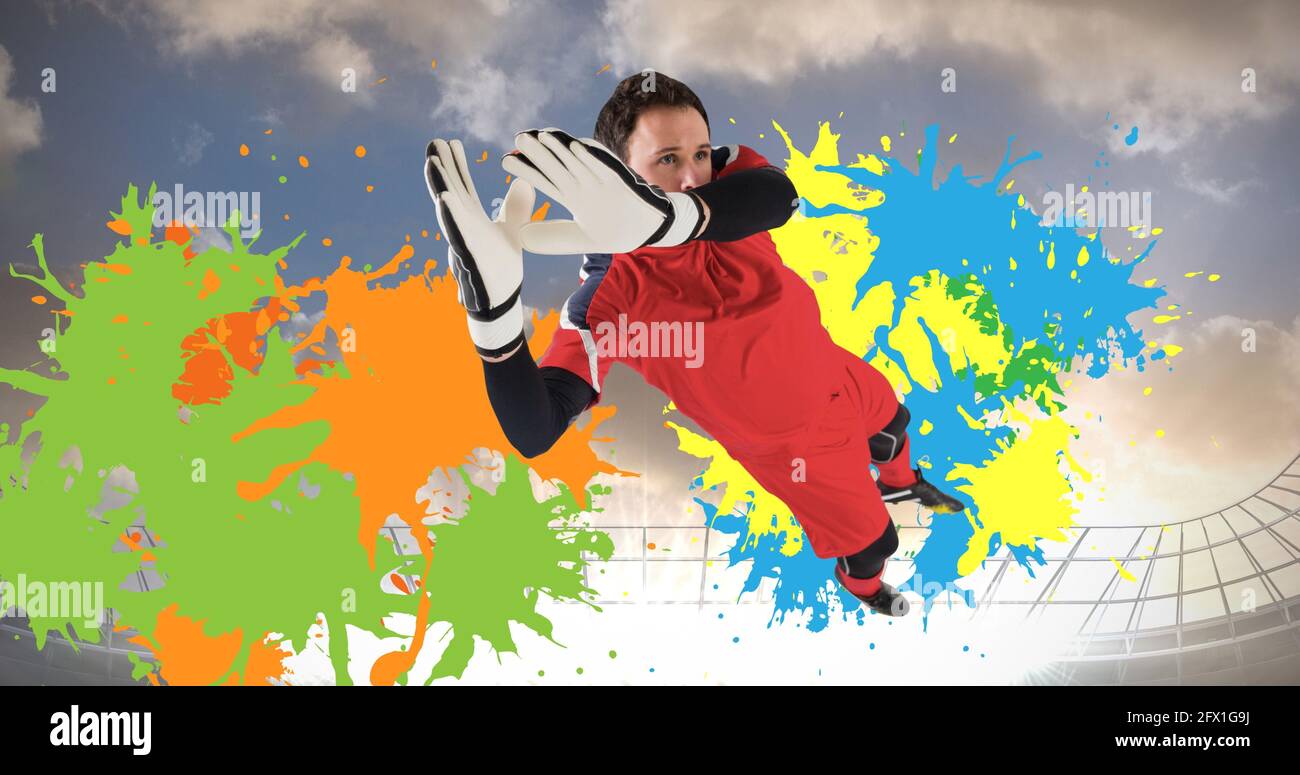 Composition of football goalkeeper over colourful splodges and sports ...