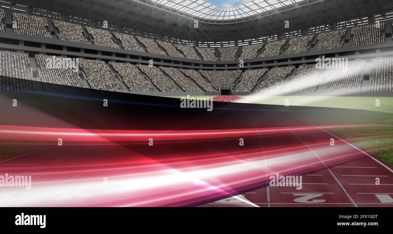 Composition of sports stadium with red and white light trails Stock ...