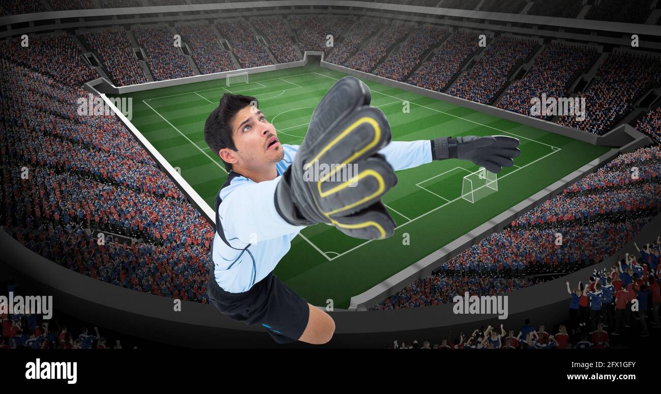 Composition of athletic male goalkeeper over football stadium Stock ...