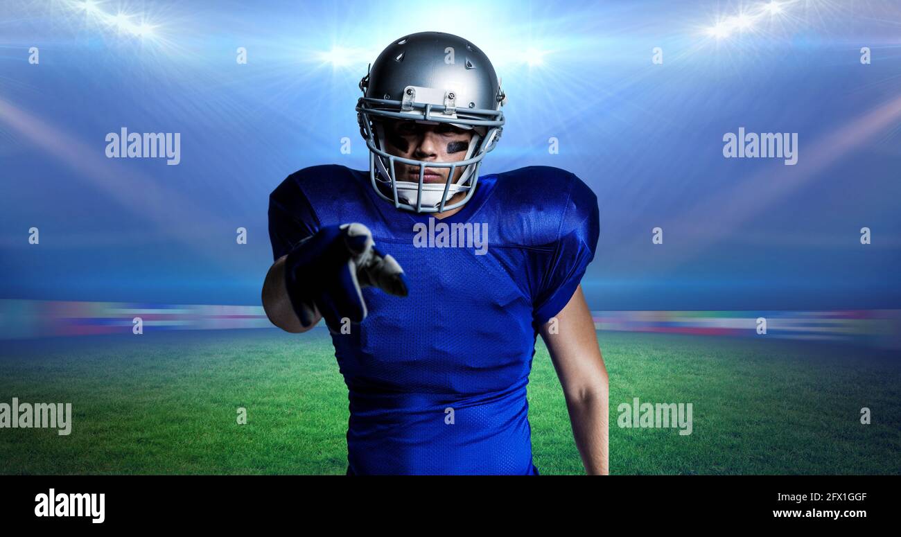 Composition of male rugby player over rugby field Stock Photo - Alamy