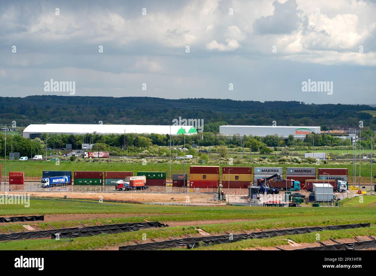 Shipping containers at a freight rail head Stock Photo - Alamy