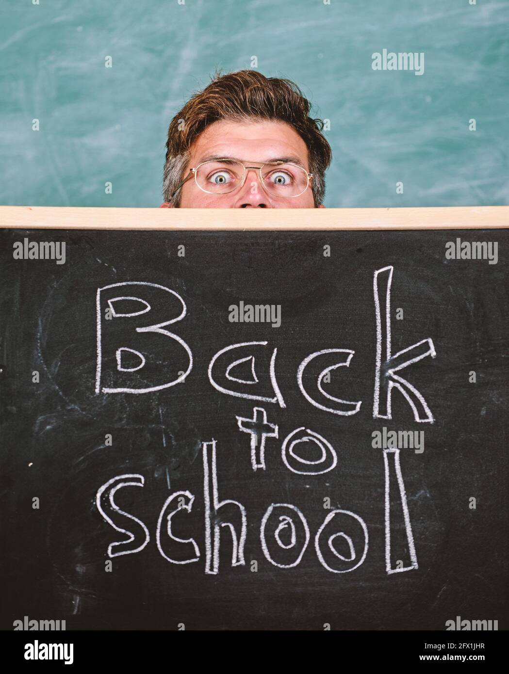 Scared teacher classroom hi-res stock photography and images - Alamy