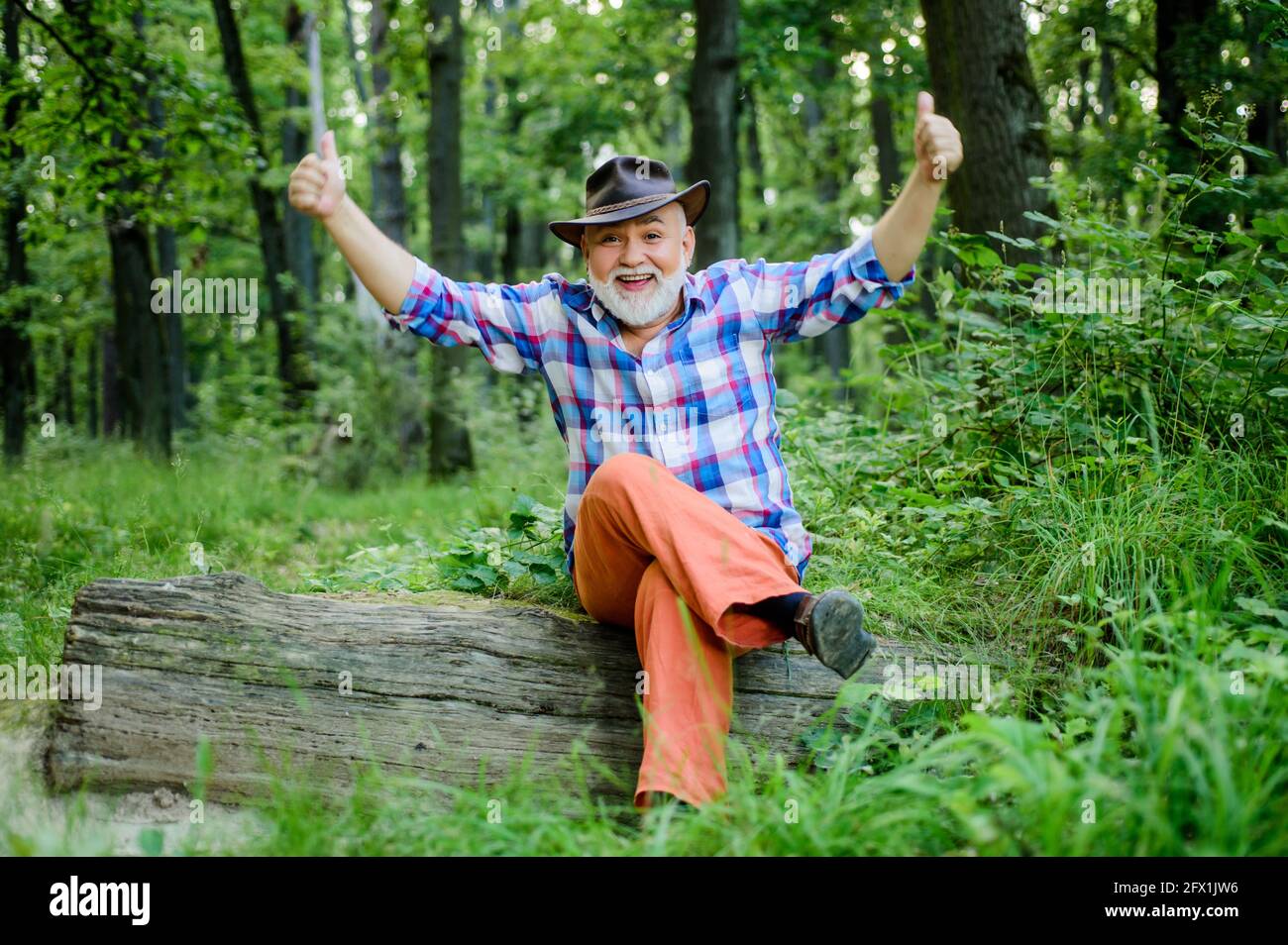 Magician in forest. Woodman magician concept. Folk magic. Mature man ...