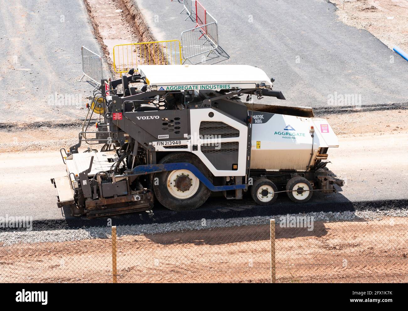 Road laying machine at work Stock Photo - Alamy