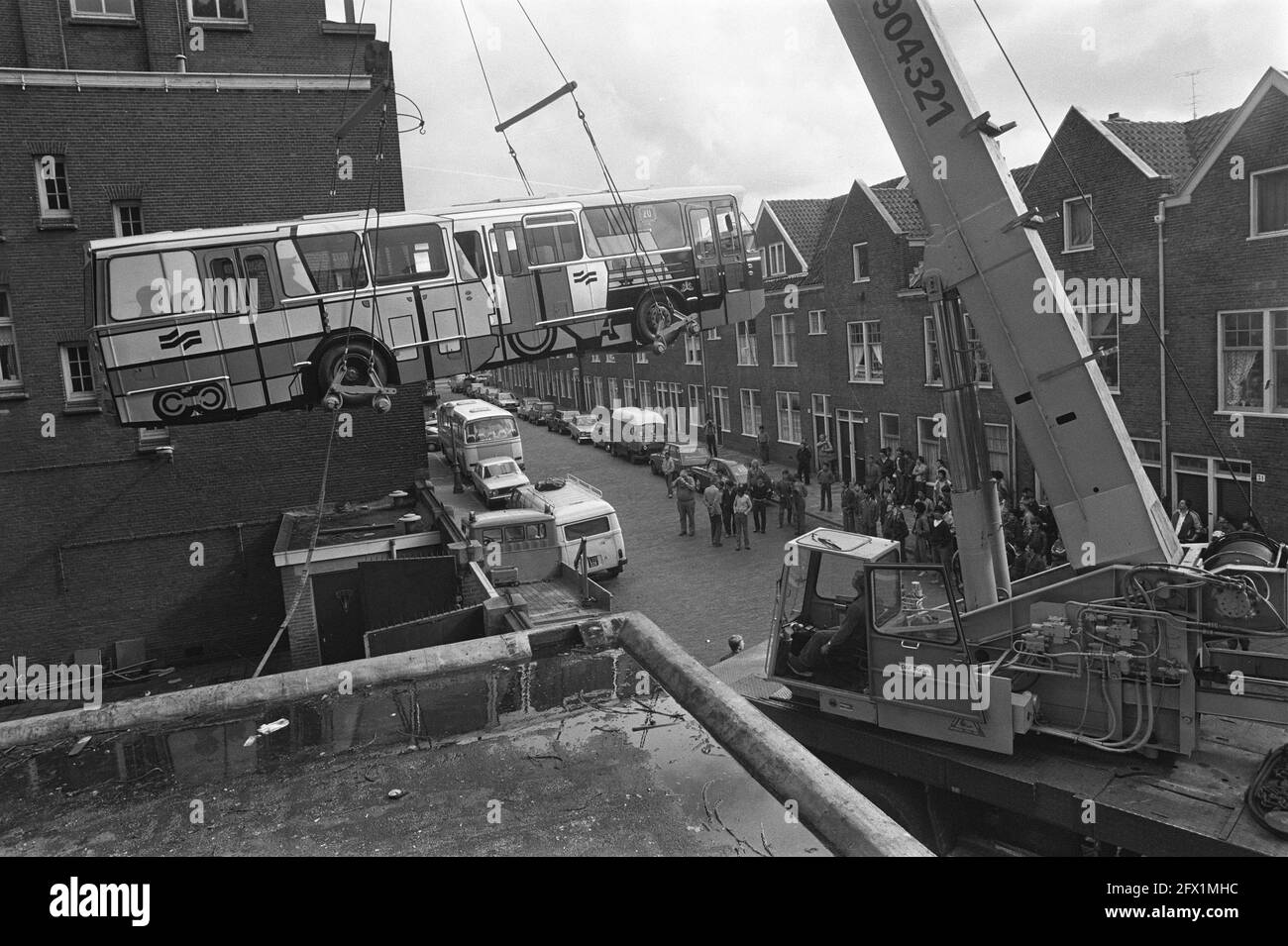 Crane hoists common bus hi-res stock photography and images - Alamy