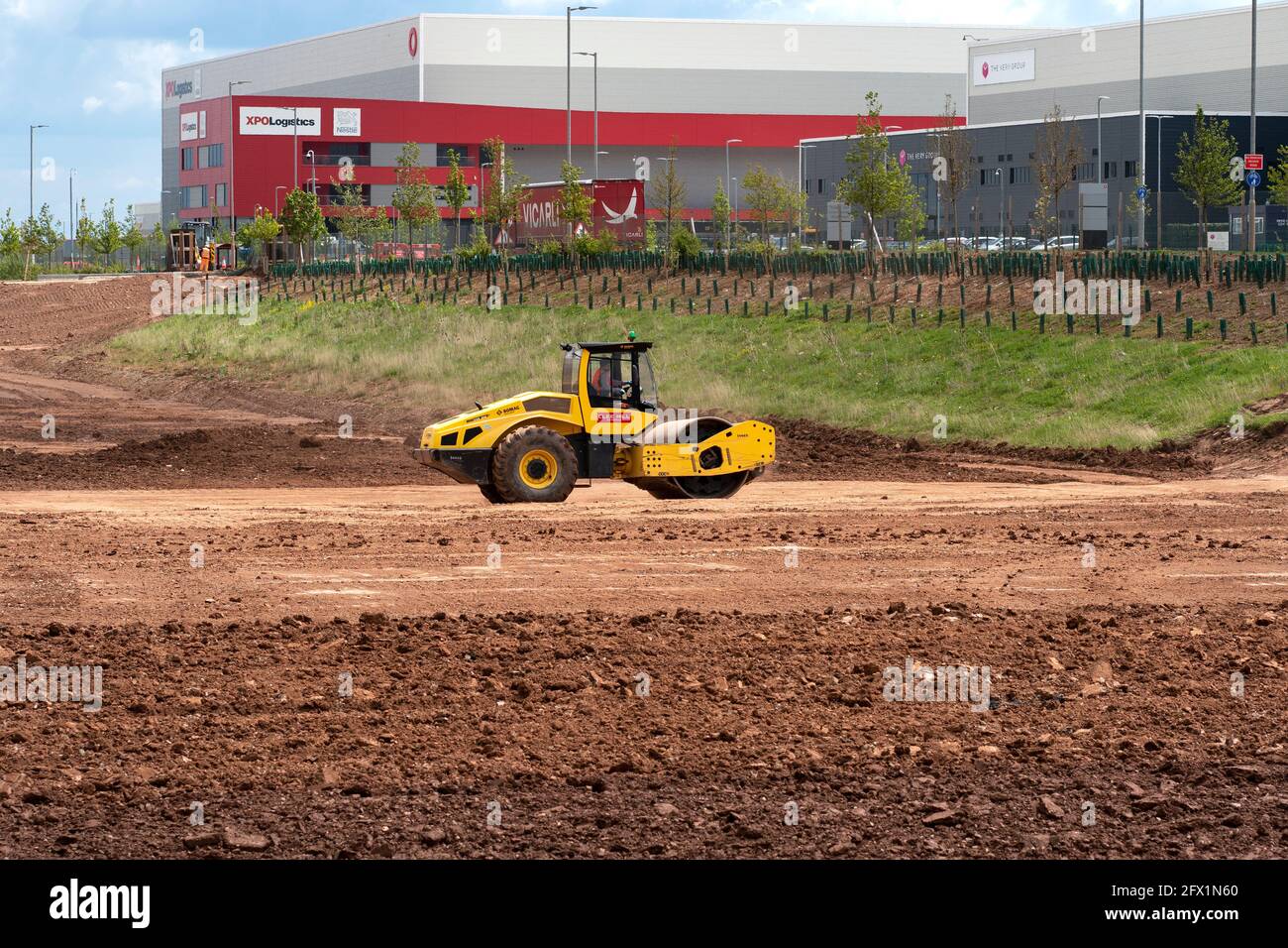 Construction roller levelling land Stock Photo - Alamy