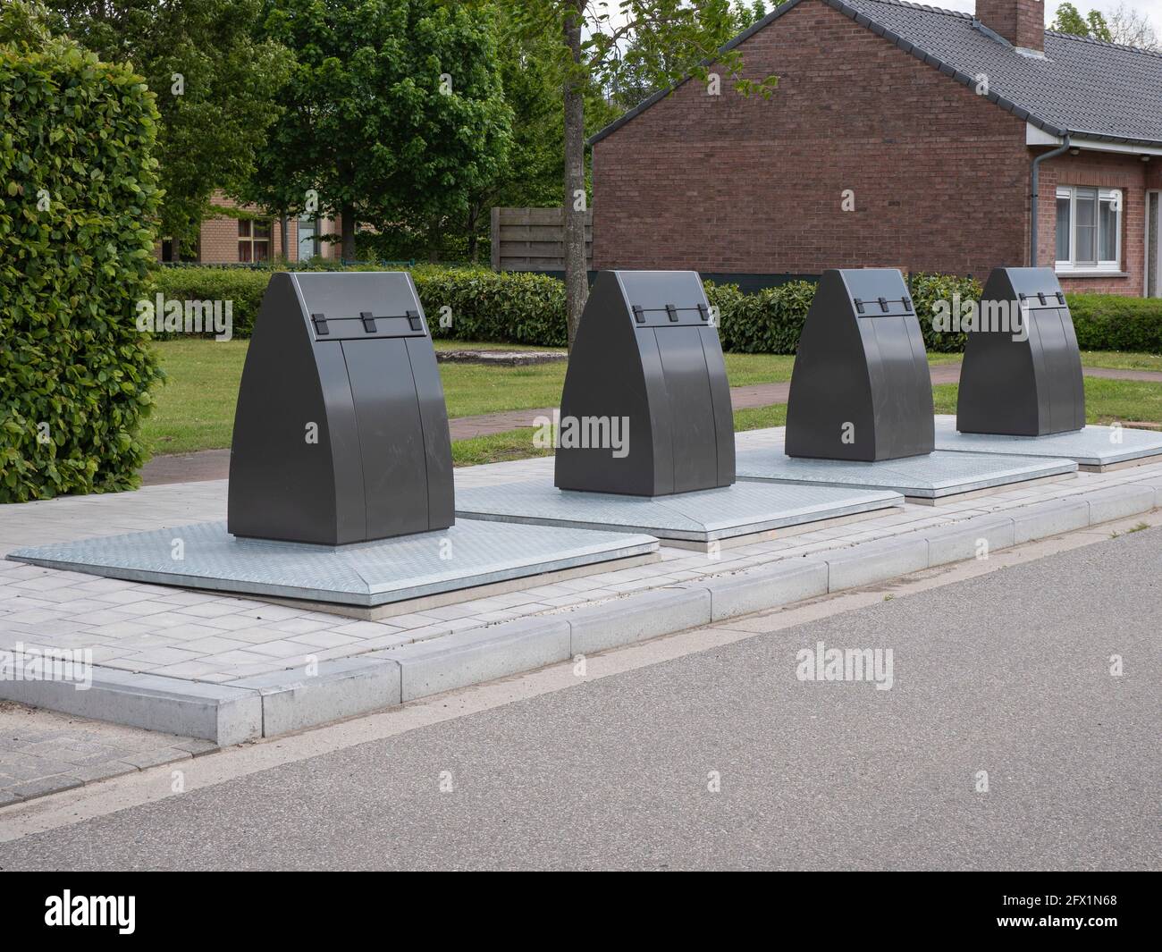 underground waste sorting containers on the edge of a residential area ...