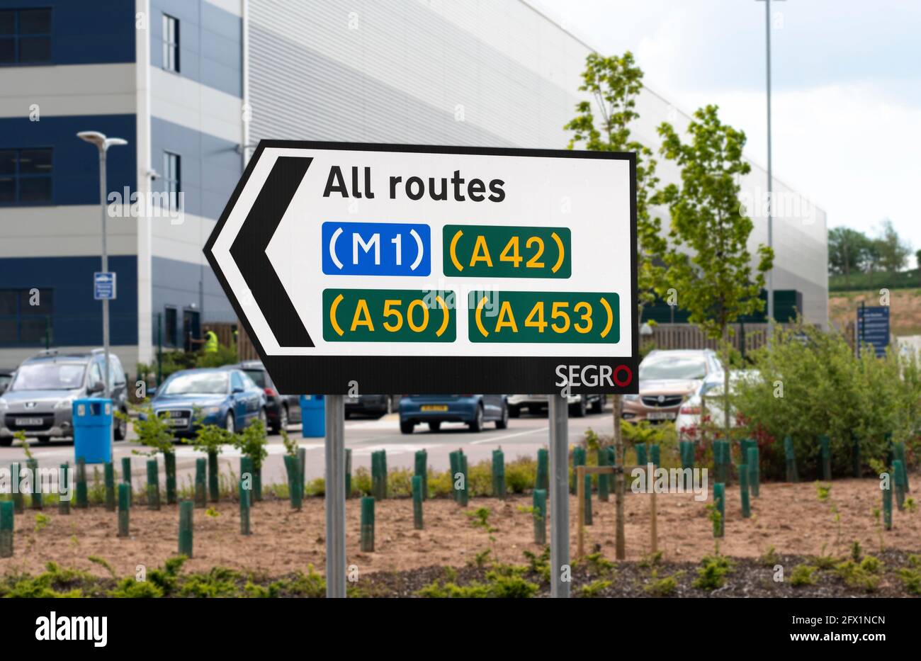 Big traffic sign post showing exit routes Stock Photo - Alamy