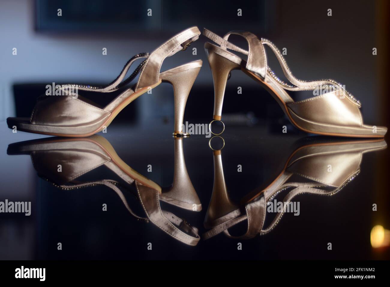 Bride shoes and rings Stock Photo - Alamy