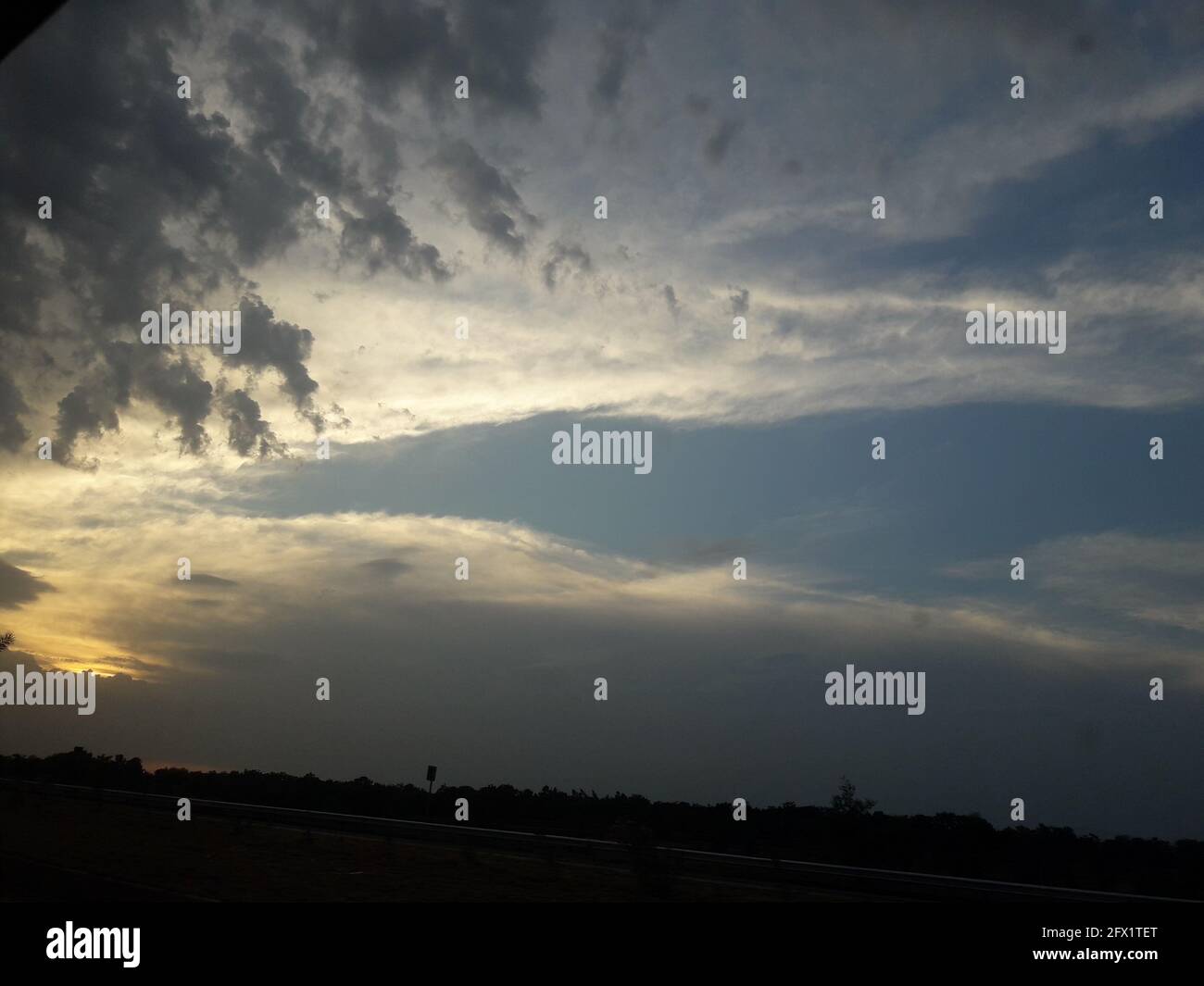 Beautiful cloudy sky with sun rays. Cloudy abstract background. Sunset ...