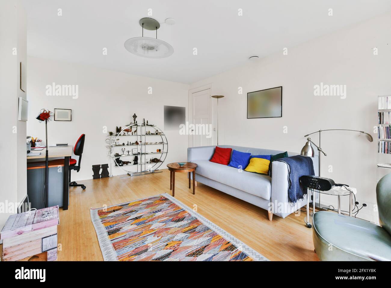 Interior of light study room with computer desk and chair against gray ...