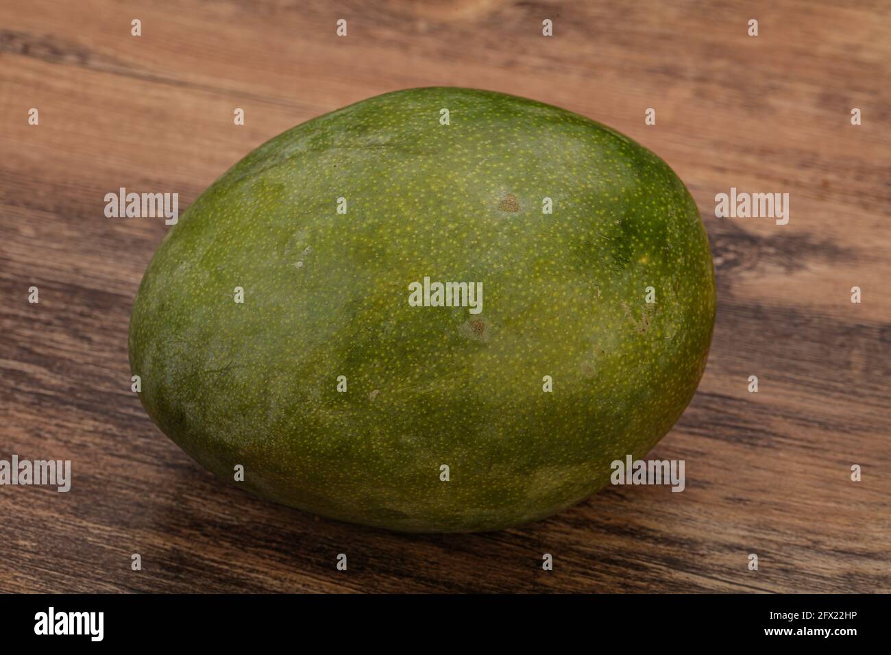 Tropical fruit - Green sweet tasty mango Stock Photo - Alamy