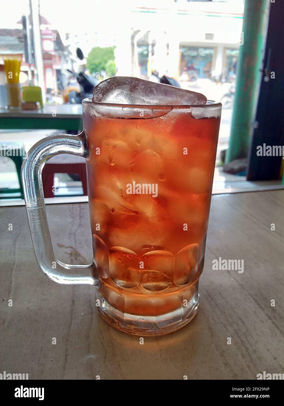 cold iced tea in a large glass photo Stock Photo - Alamy