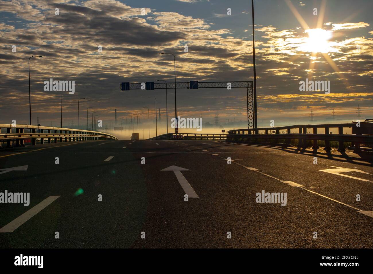 Highway at dawn. Freeway in the morning. Road markings Stock Photo - Alamy