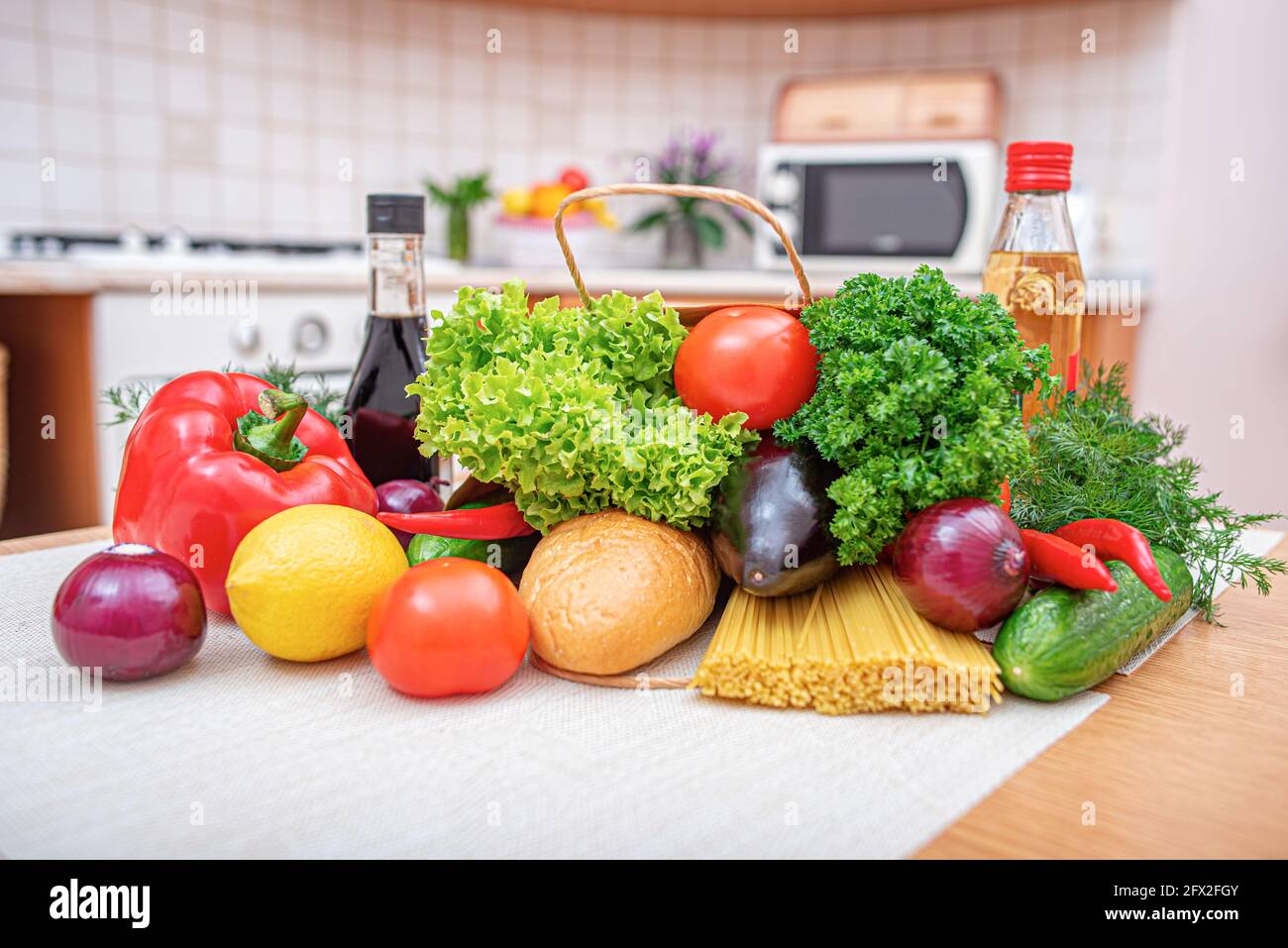 Healthy food products on the table in the kitchen Stock Photo - Alamy