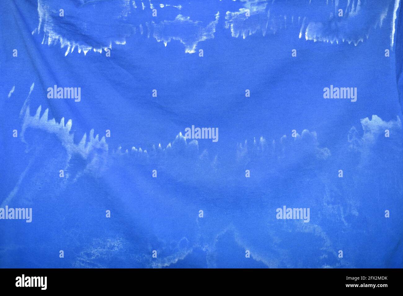White salty sweat stains on blue clothes Stock Photo - Alamy