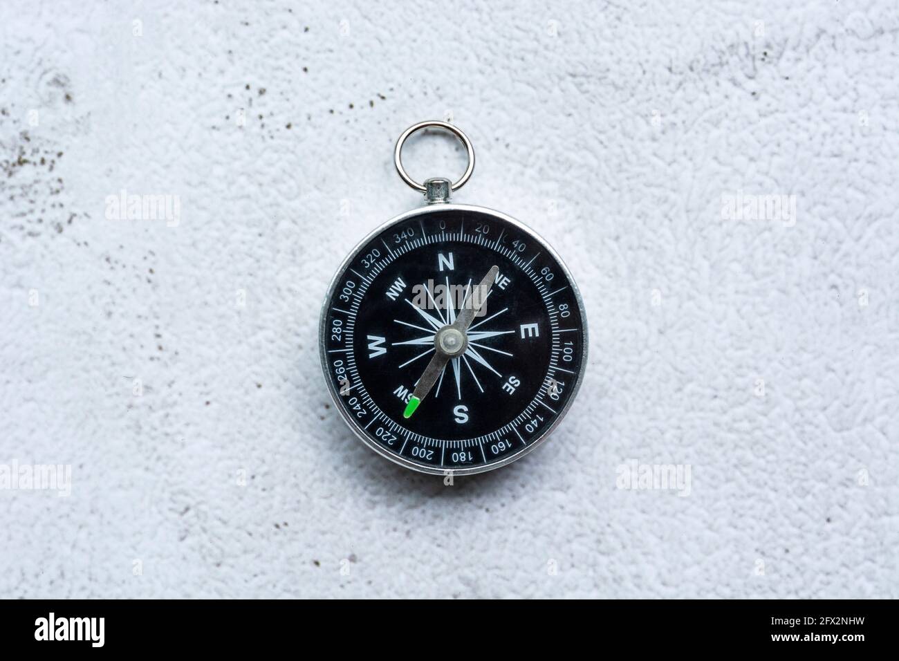 Classic round compass on white background. For text use Stock Photo - Alamy
