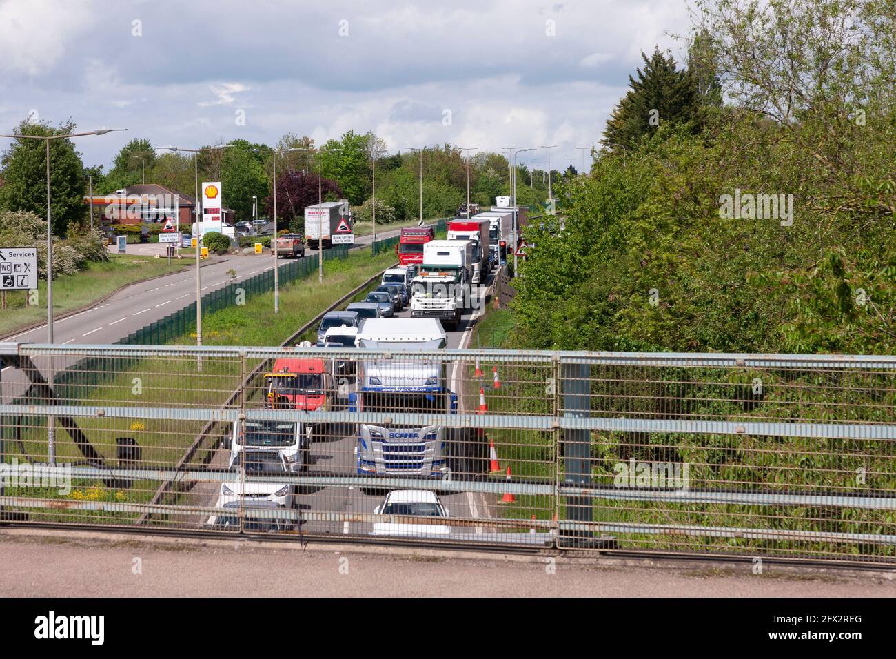 Traffic on the M1 Highway approaching the two one way toll bridges ...