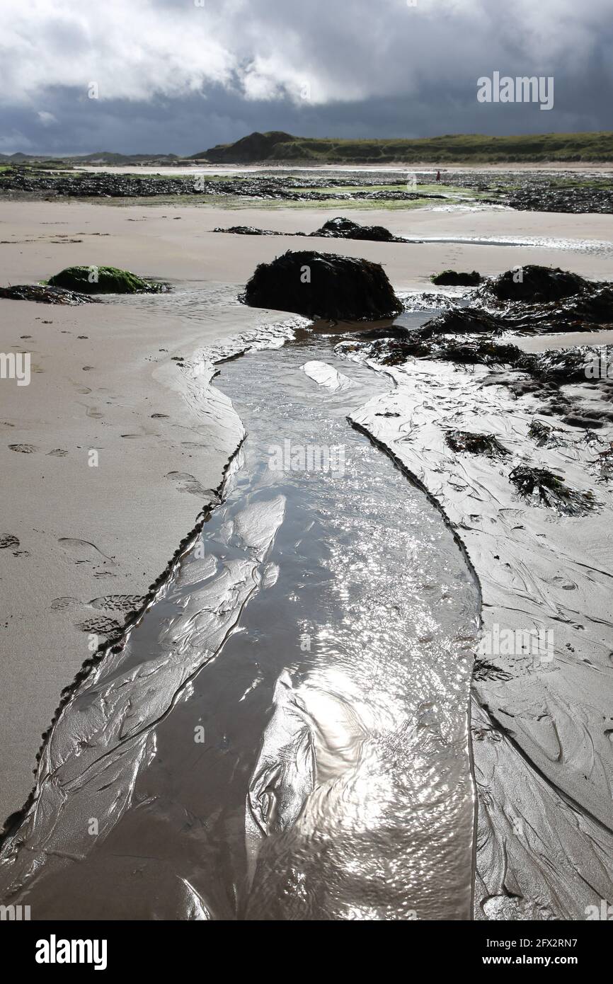 Water track on beach Stock Photo - Alamy