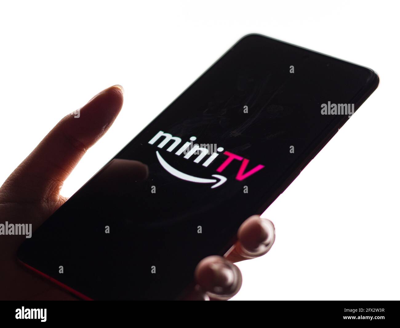 Assam, india - May 18, 2021 : Amazon mini TV logo on phone screen stock ...