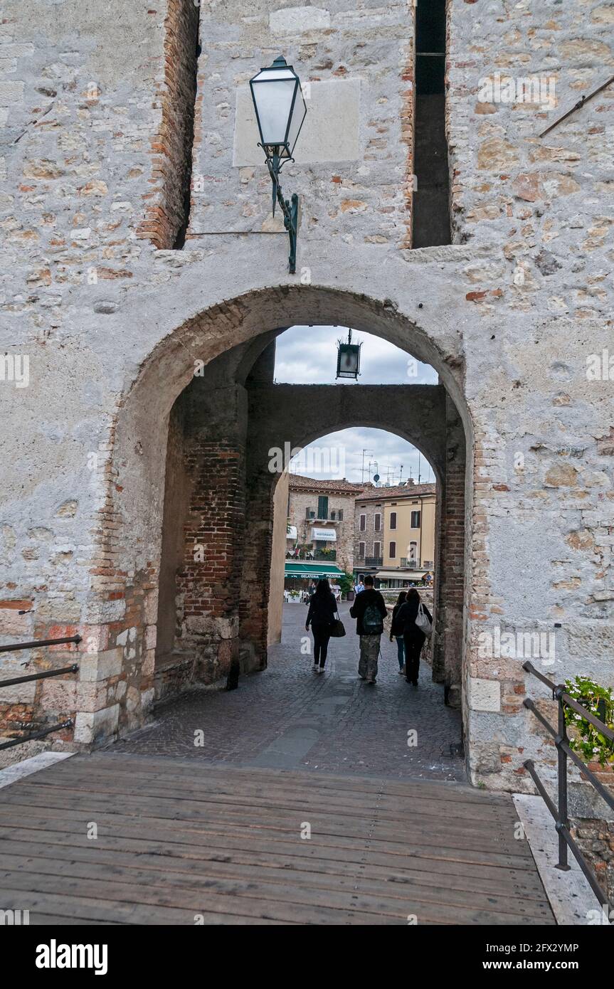 The main gate into the fortified medieval town, Sirmione, with a 13th ...