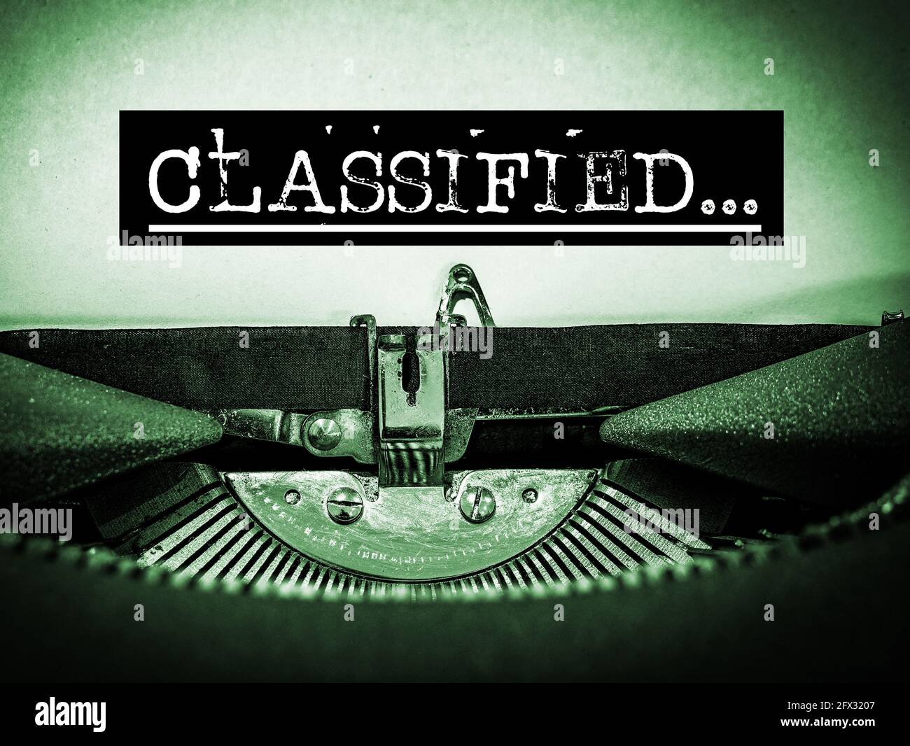 Classified in green tone printed on a vintage typewriter Stock Photo ...