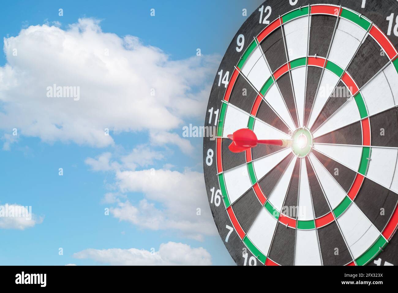 Red dart hitting a target on center of Bullseye or Dartboard. Business ...