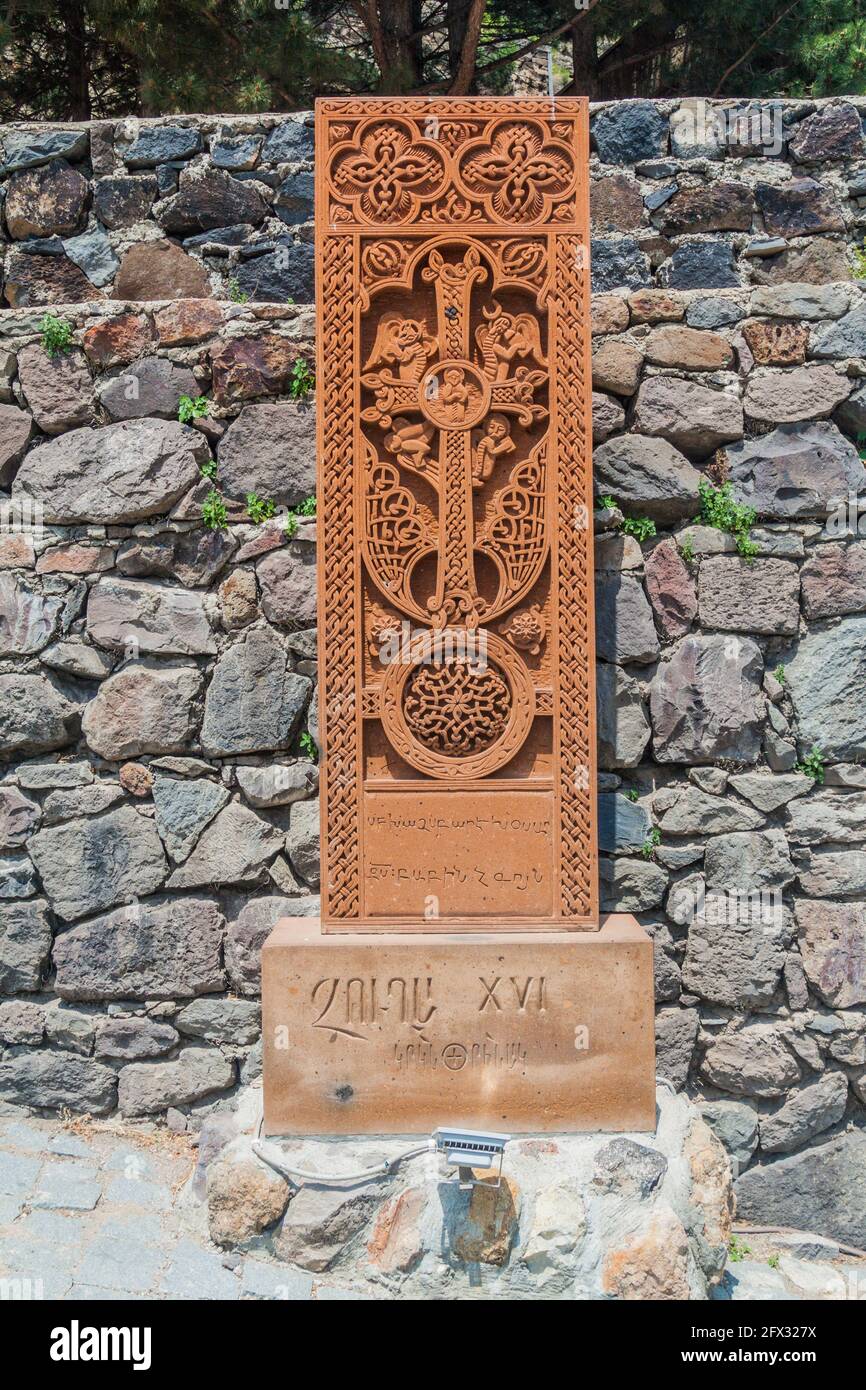 Stone cross (Khachkar) at Geghard monastery in Armenia Stock Photo - Alamy