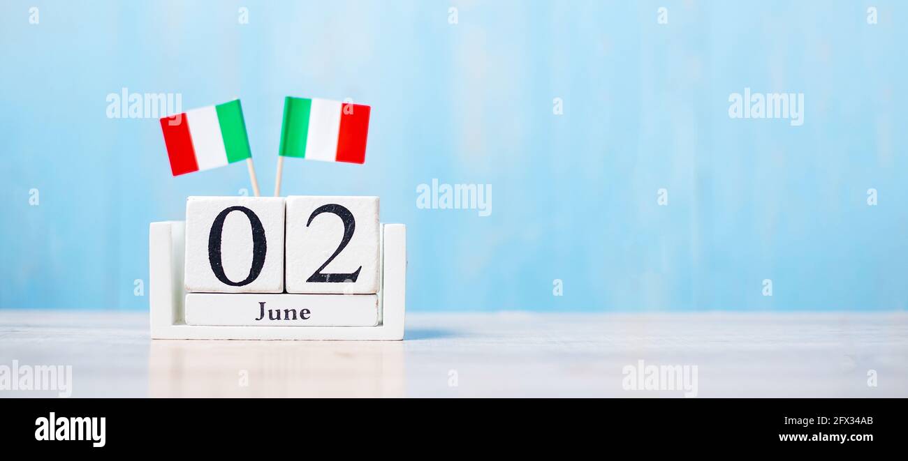 Wooden calendar of June 2nd with miniature Italy flags. National Day ...