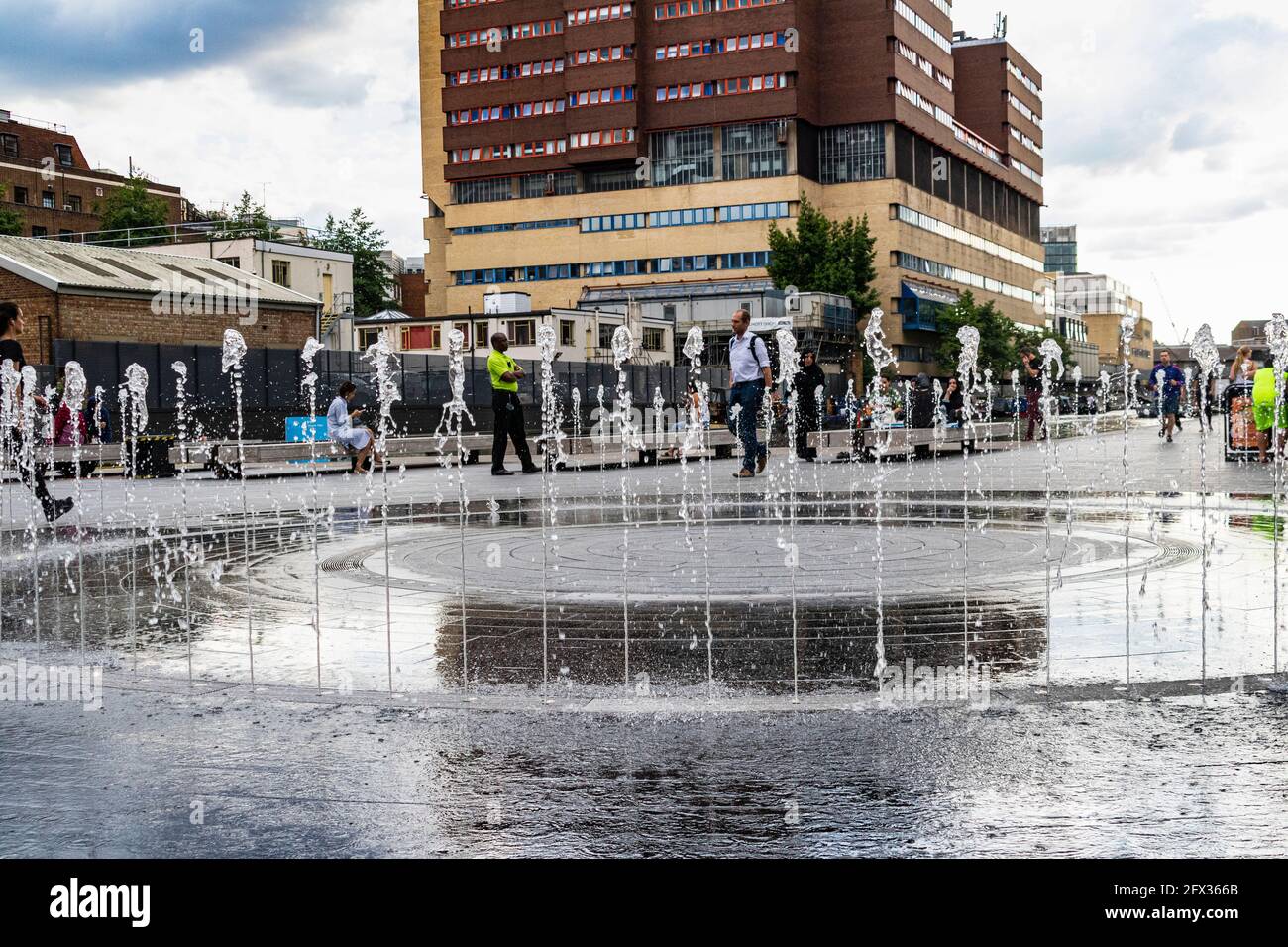 Low Level, Fountain View of the Paddington Basin Area with People ...
