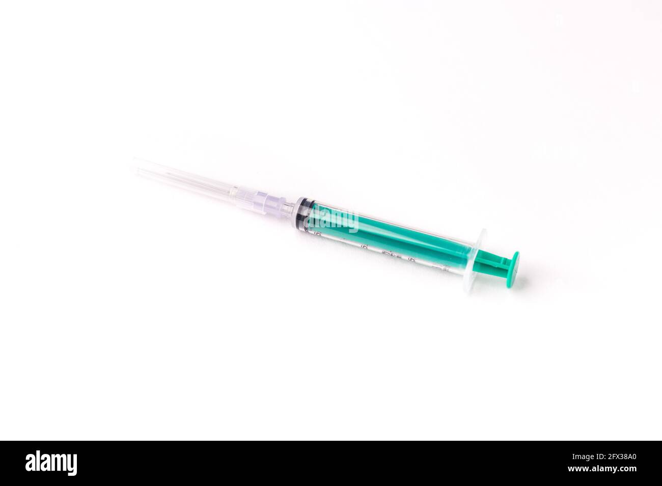 Plastic Syringe isolated stock image on texture background Stock Photo ...