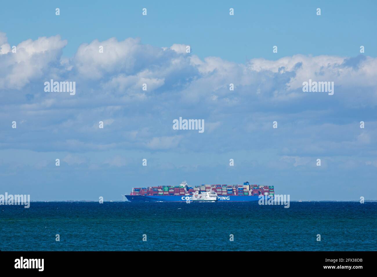container ship and ferry off Puttgarden, Fehmarn Island, Schleswig ...