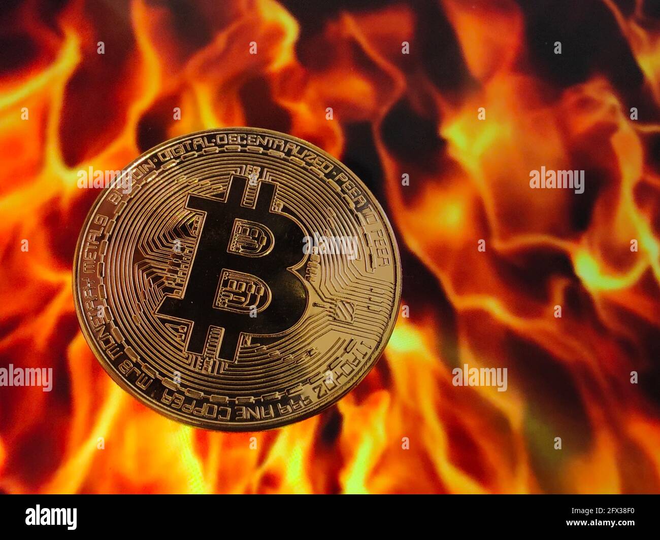 Bitcoin on fire hi-res stock photography and images - Alamy
