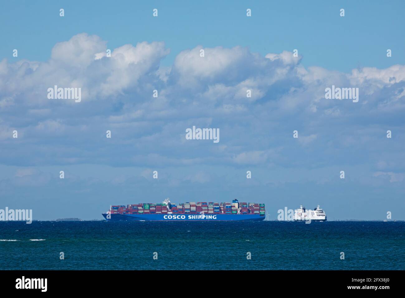 container ship and ferry off Puttgarden, Fehmarn Island, Schleswig ...