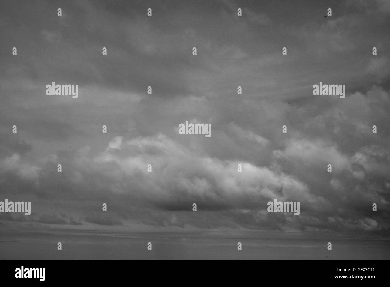 Blue skies with high clouds Black and White Stock Photos & Images - Alamy