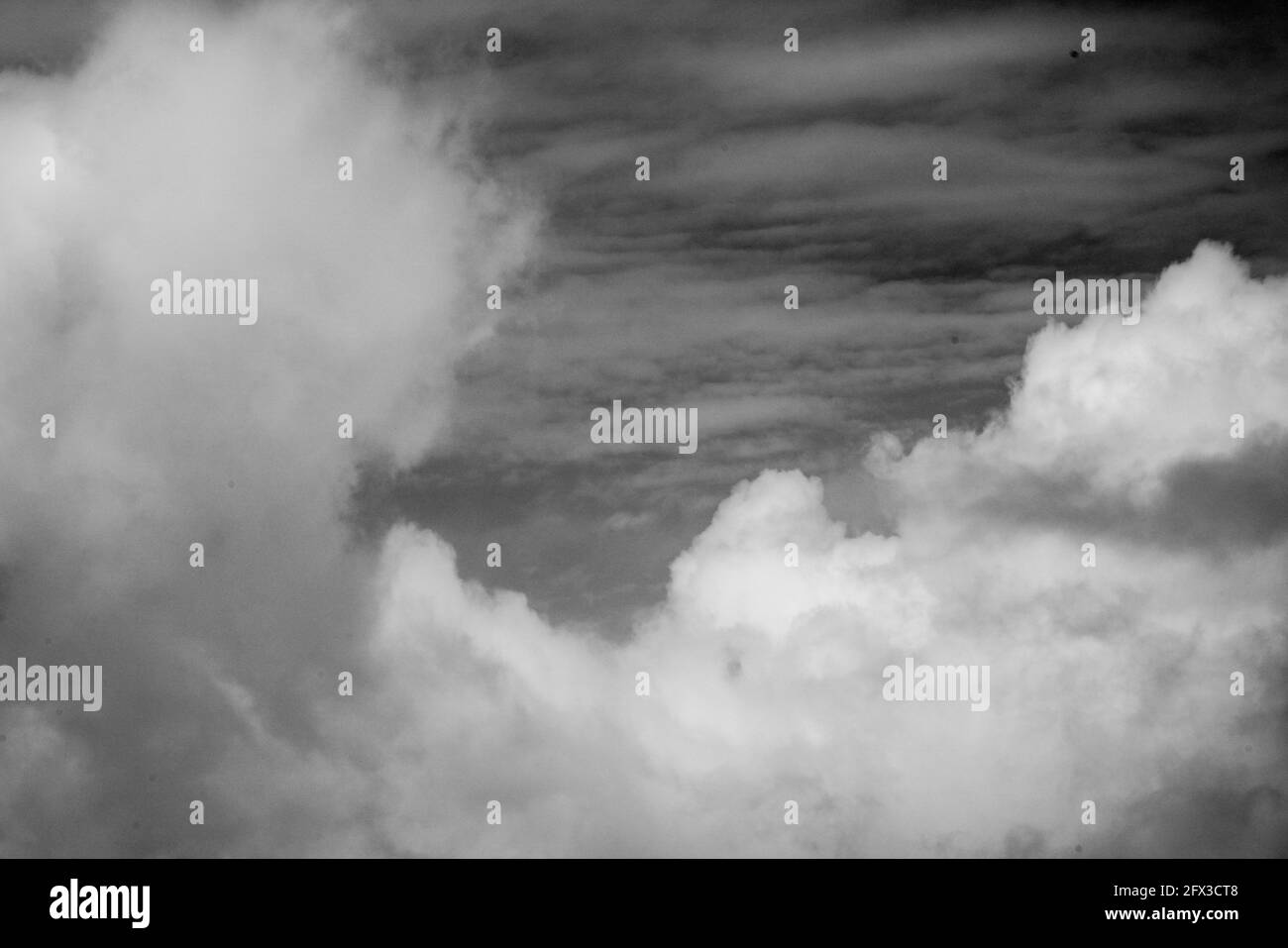 Blue skies with high clouds Black and White Stock Photos & Images - Alamy