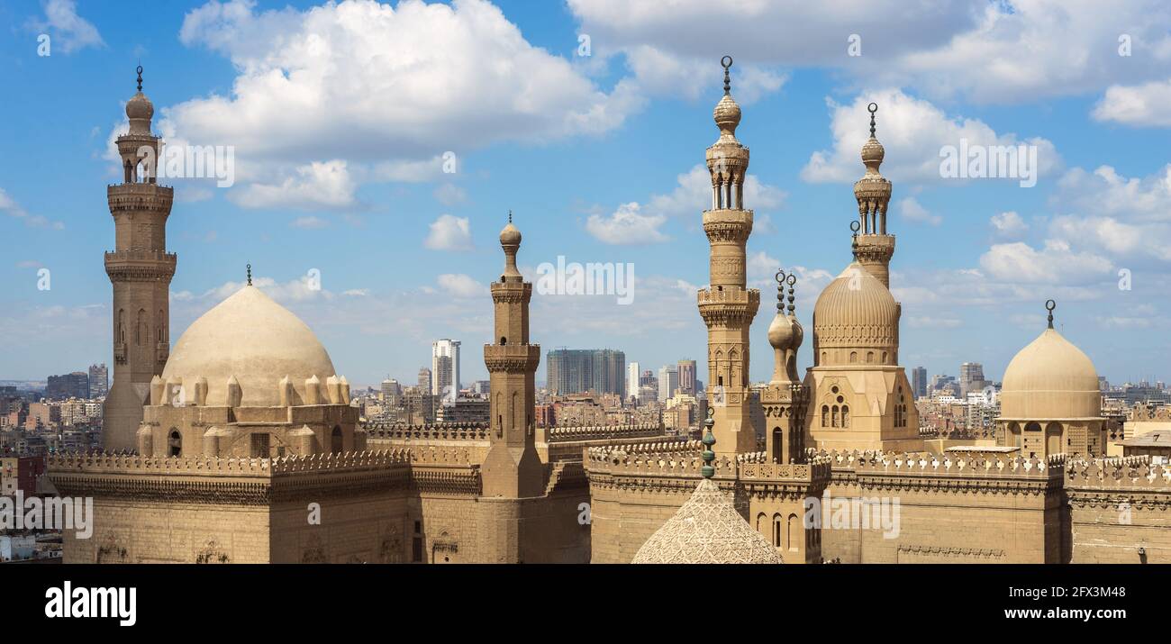 Aerial day shot of minarets and domes of Sultan Hasan mosque and Al ...