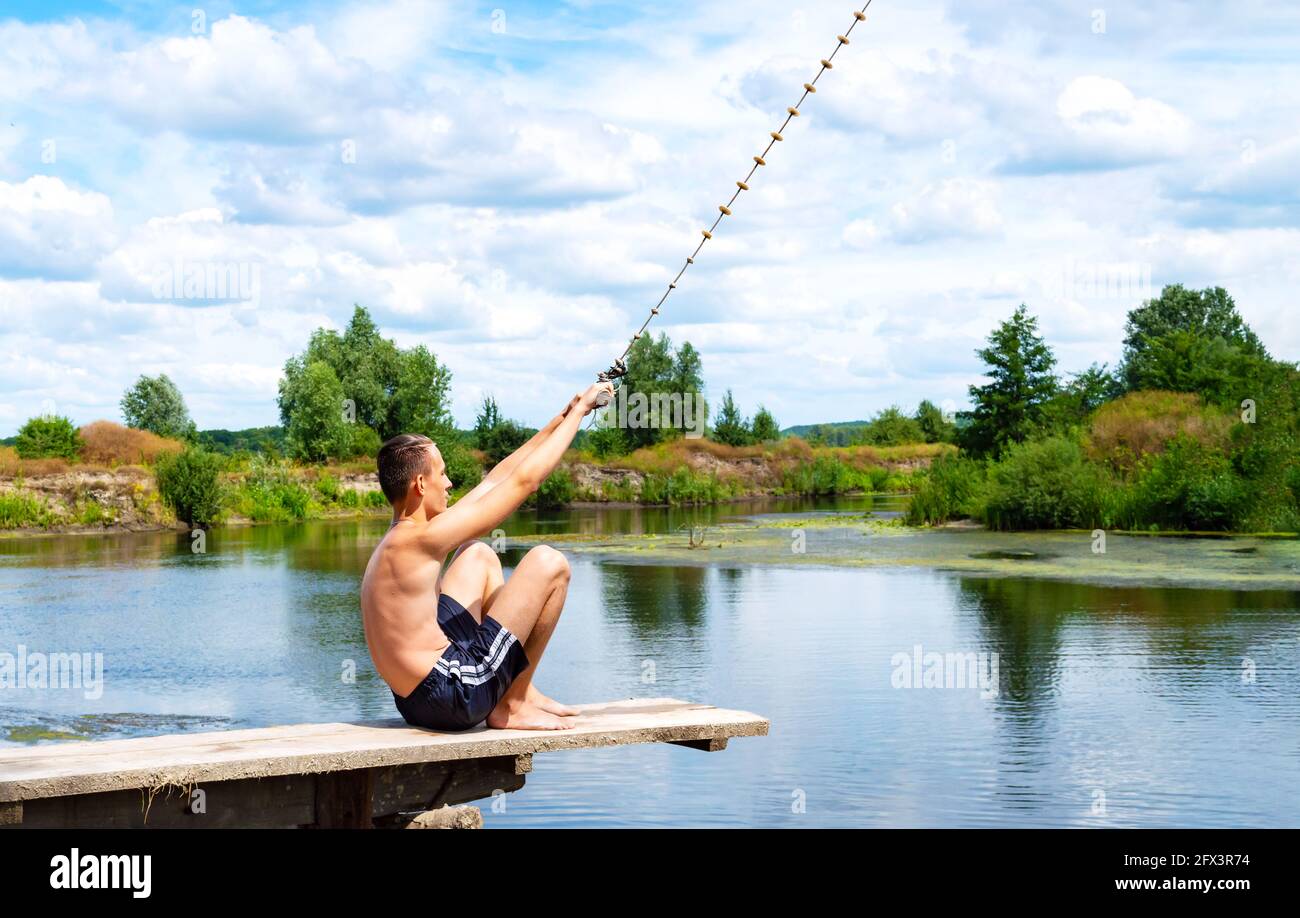 Boy diving into river hi-res stock photography and images - Alamy