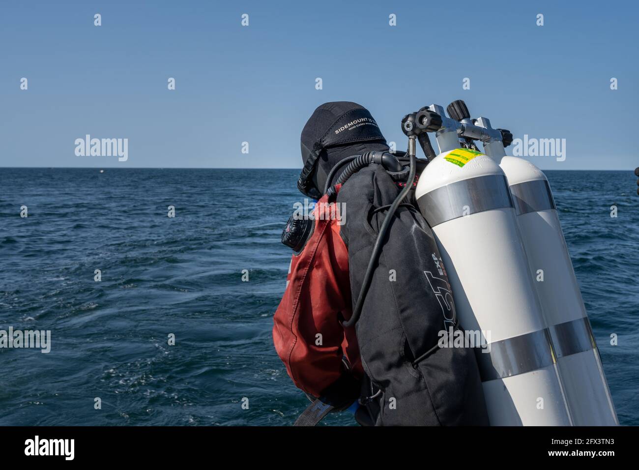 April 17, 2021 - Hamburgsund, Sweden: A scuba diver enters the water ...