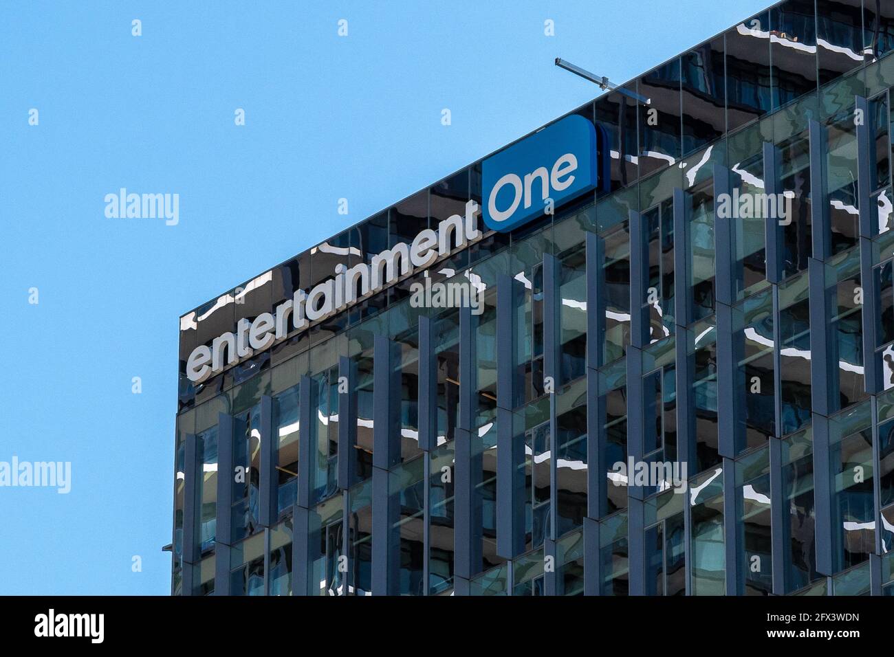 Entertainment One sing or logo in a modern building seen from Queen ...