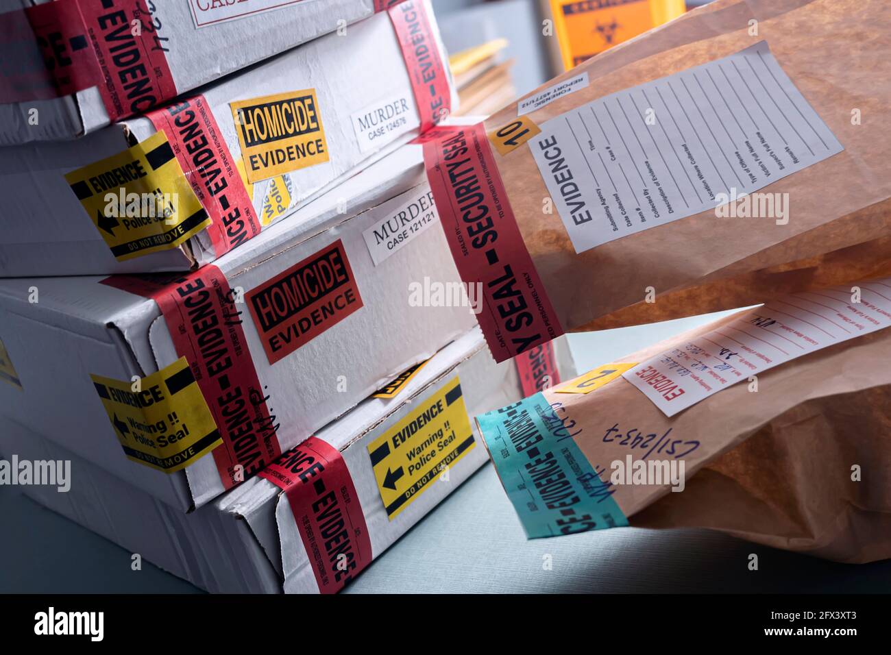 Files and evidence bag in a crime lab, conceptual image Stock Photo - Alamy